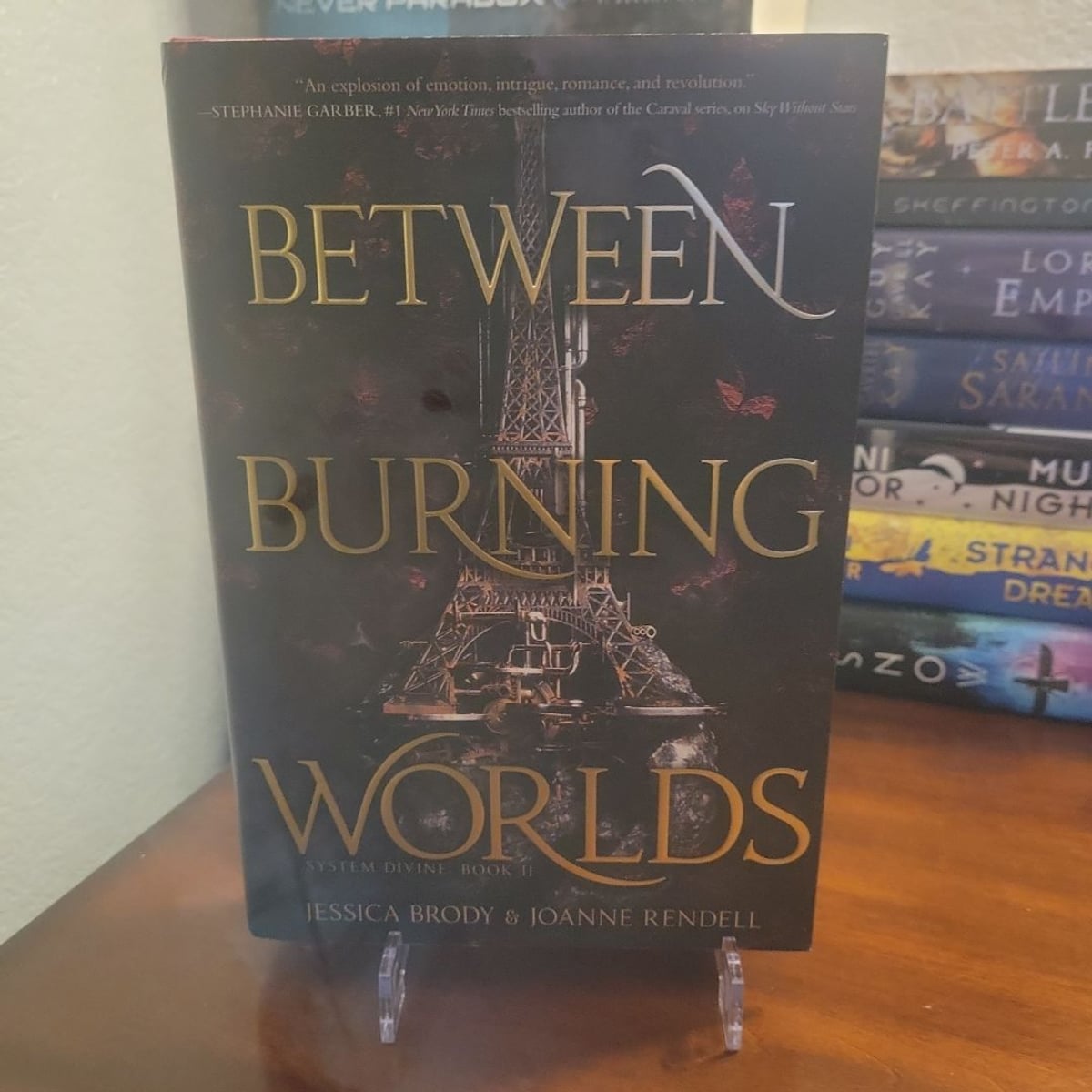 Between Burning Worlds by Jessica Brody, Joanne Rendell