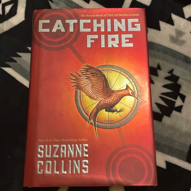 Catching Fire by Suzanne Collins, Hardcover | Pangobooks