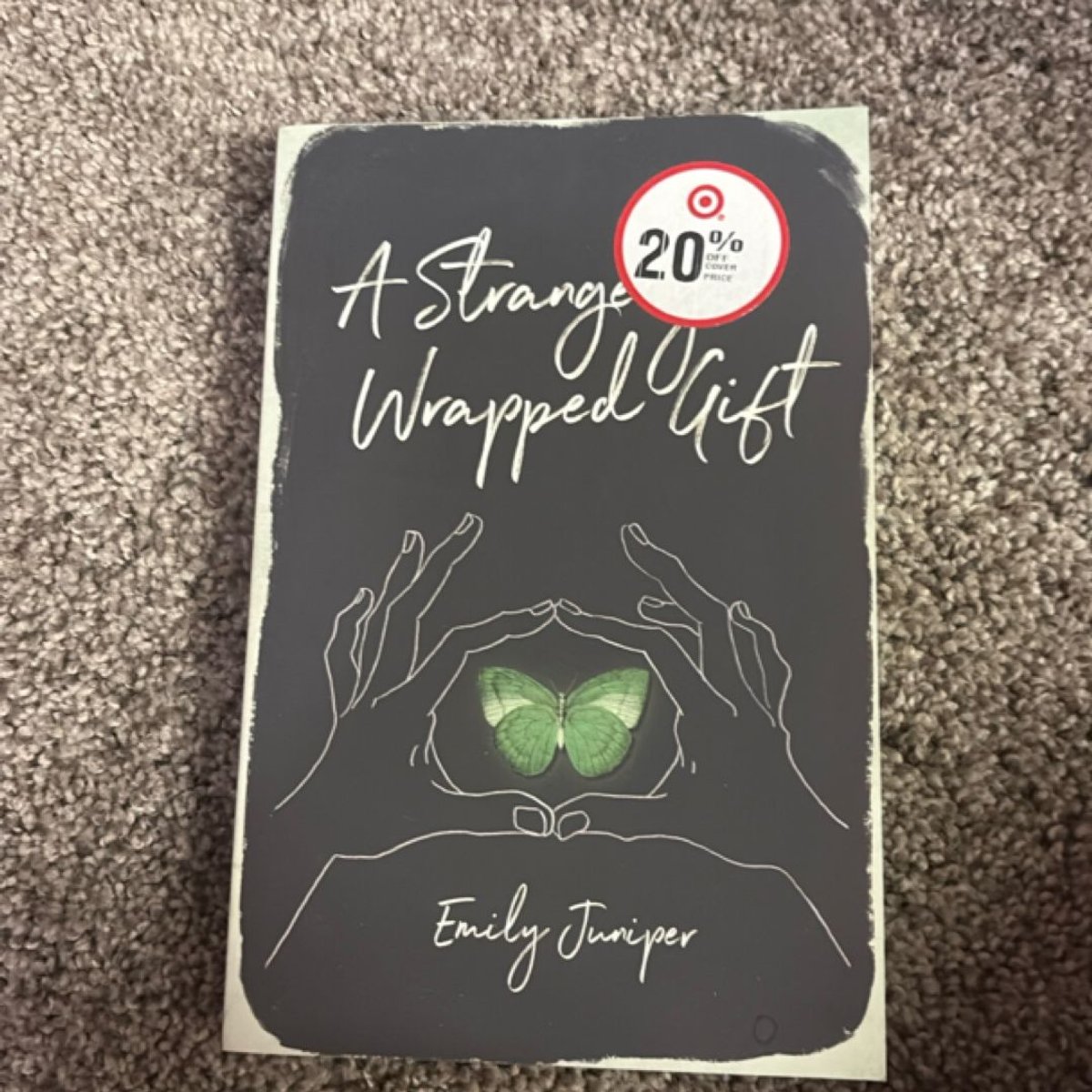 A Strangely Wrapped Gift by Emily Juniper