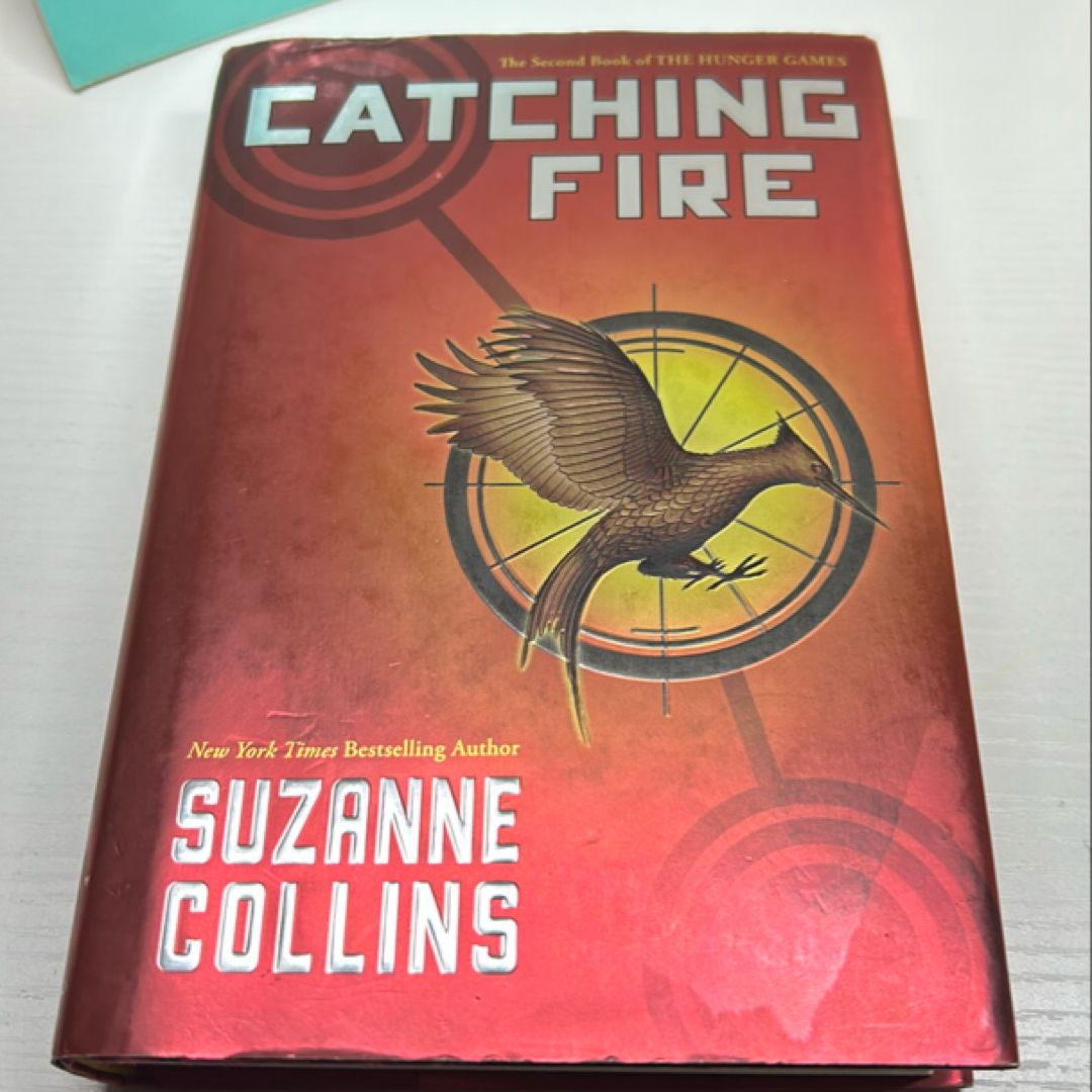 Catching Fire by Suzanne Collins, Hardcover | Pangobooks