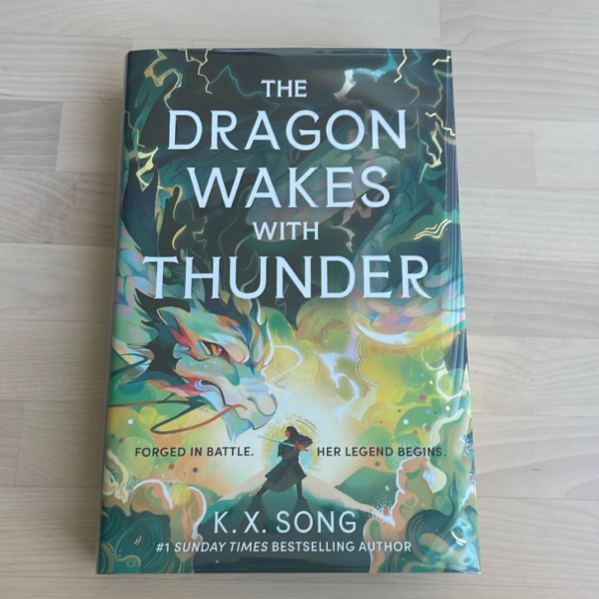The Dragon Wakes with Thunder by K. X. Song