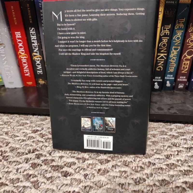 The Shadows Between Us by Tricia Levenseller, Hardcover | Pangobooks