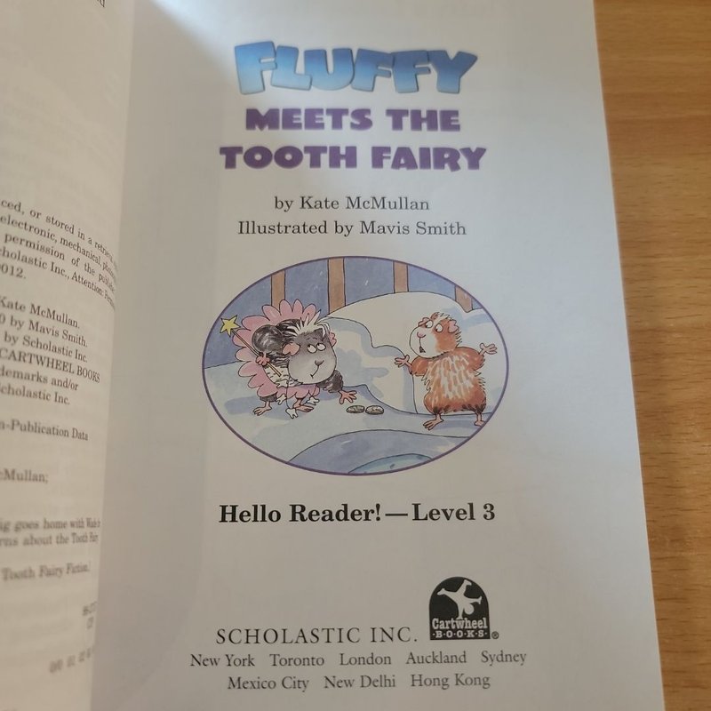 Fluffy Meets the Tooth Fairy by Kate McMullan