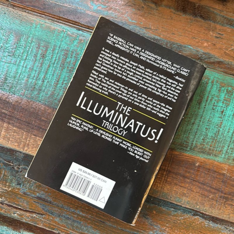 The Illuminatus! Trilogy by Robert Shea, Paperback | Pangobooks