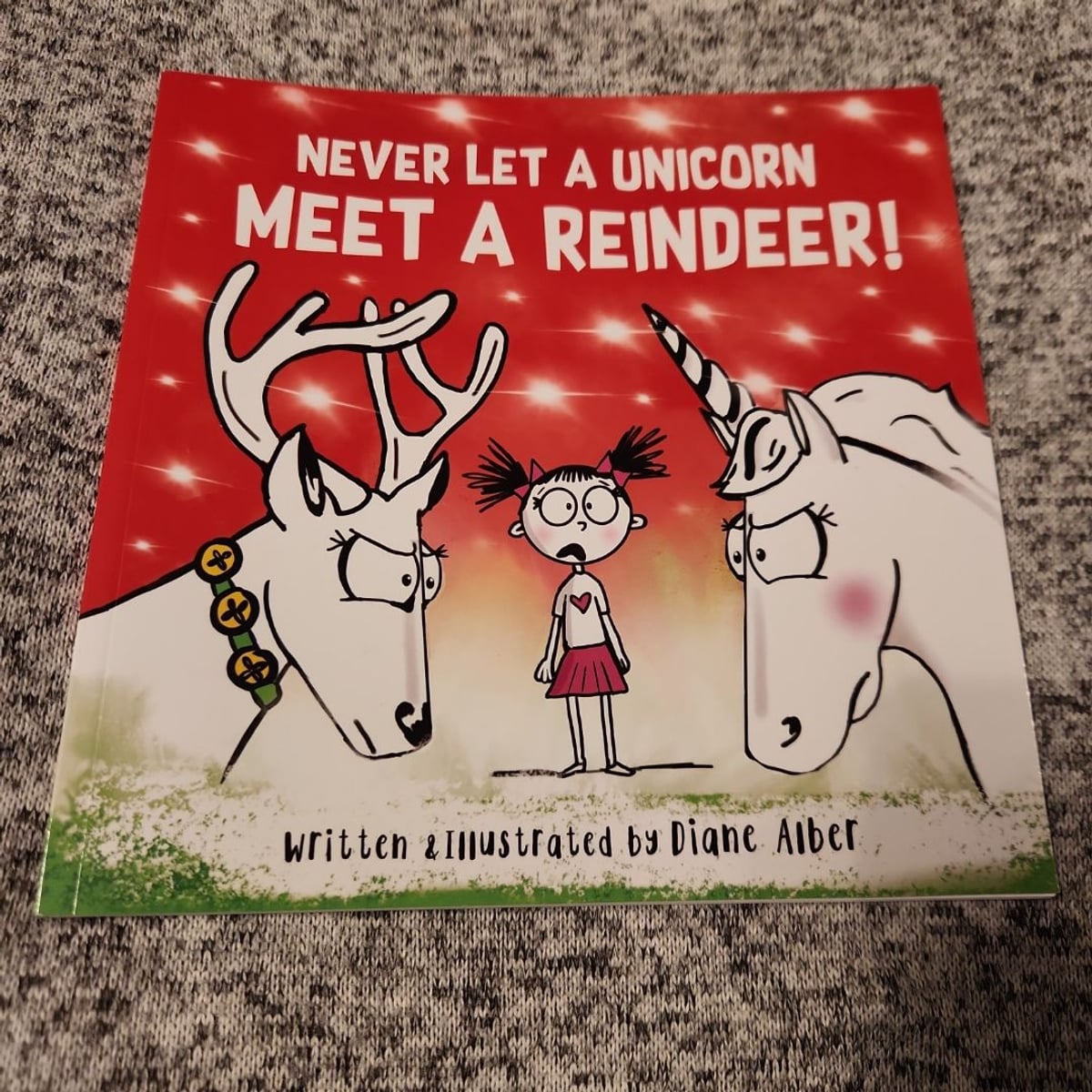 Never Let a Unicorn Meet a Reindeer! by Diane Alber