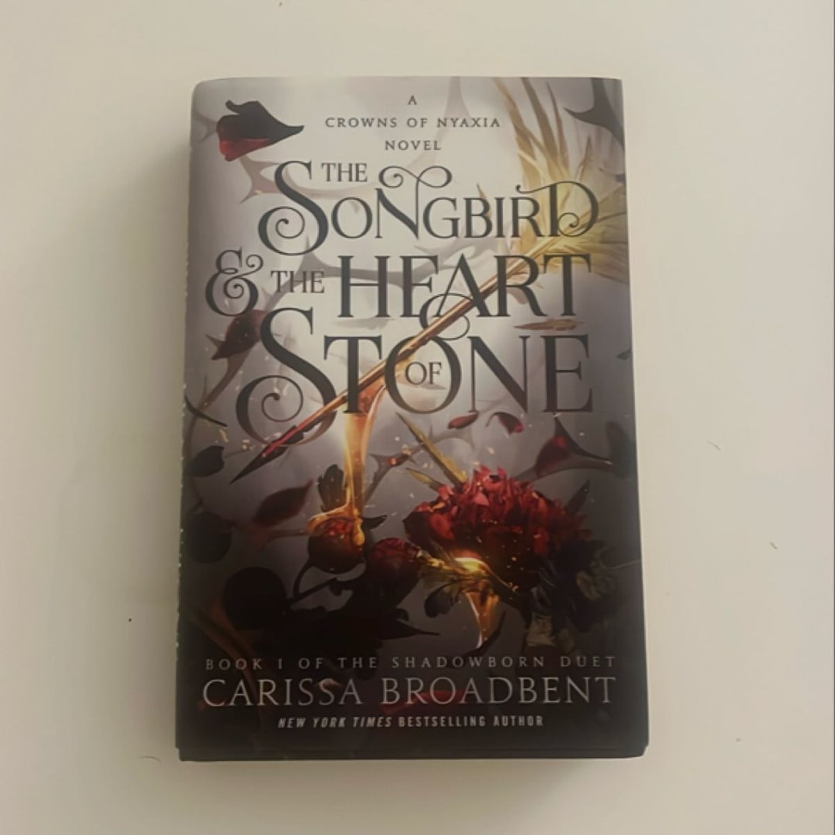 The Songbird and the Heart of Stone by Carissa Broadbent, Hardcover ...