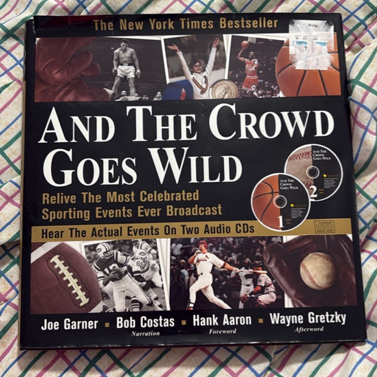 And the Crowd Goes Wild by Joe Garner, Bob Costas, Hank Aaron, Wayne ...